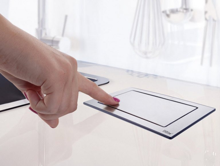 The EVOline BackFlip white glass; nearly flush on the worktop